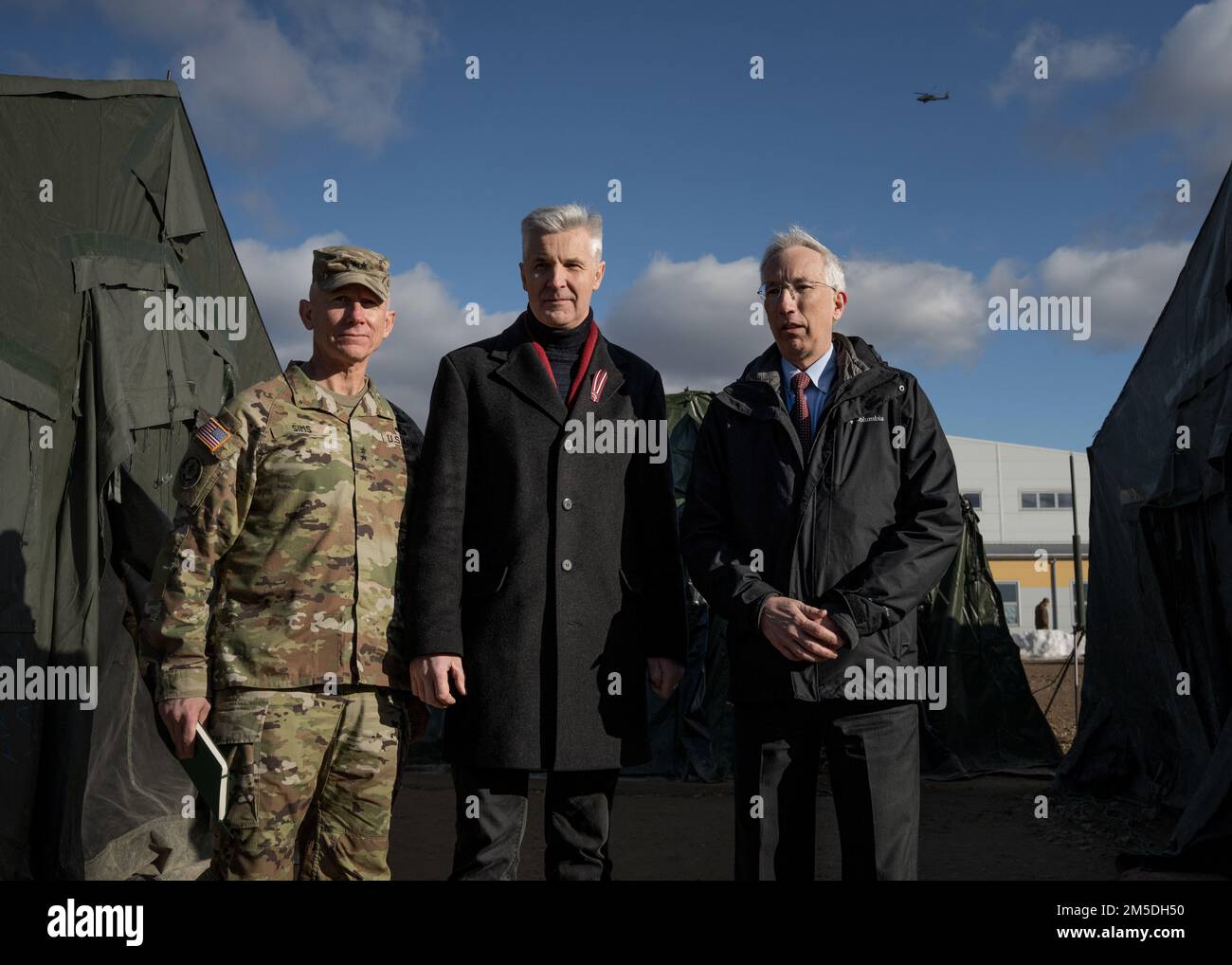 Artis Pabriks, Latvia Minister of Defence (center), John L. Carwile ...