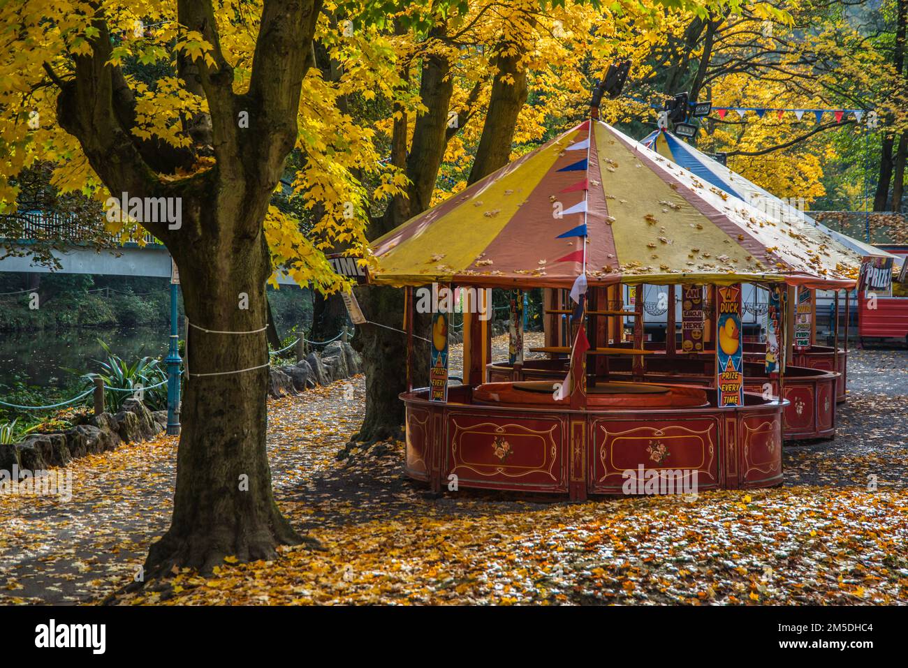 Fairground stalls in autumn before opening time at Matlock Bath ...