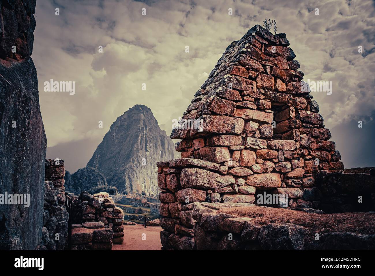 The ancient stone buildings in Machu Picchu, Peru Stock Photo - Alamy
