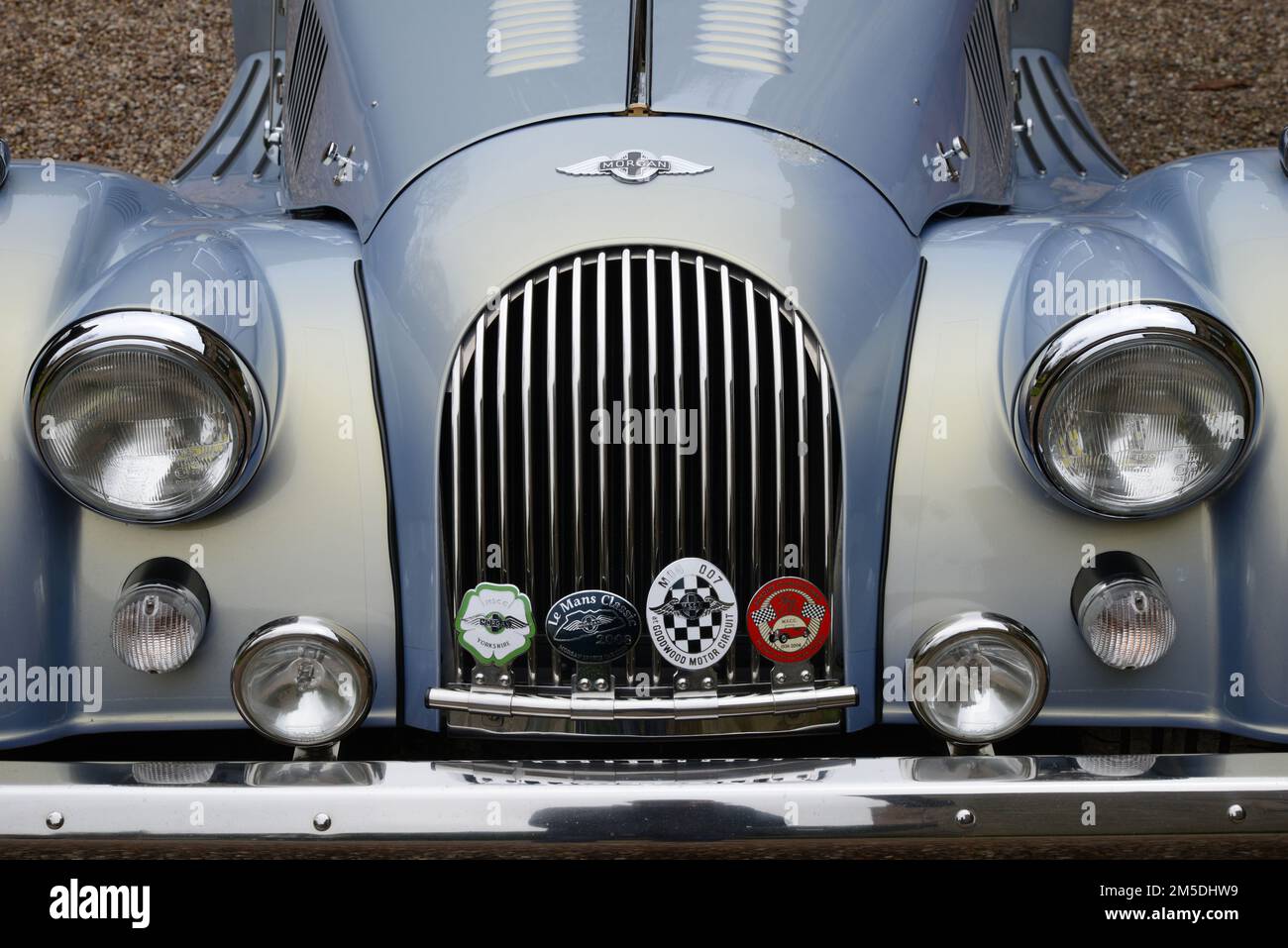 The front end of a Morgan Plus 8 sports car in silver grey Stock Photo ...