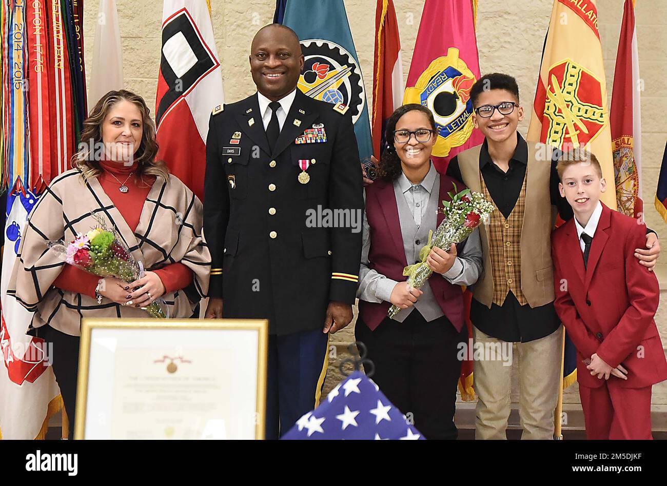 Capt. Michael Davis, U.S. Army Sustainment Command, stands with his ...