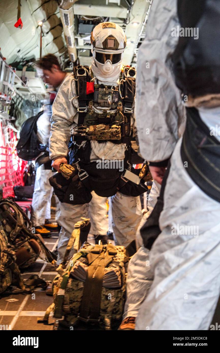 U.S. Navy SEALs conduct a High Altitude Low Opening (HALO) airborne ...