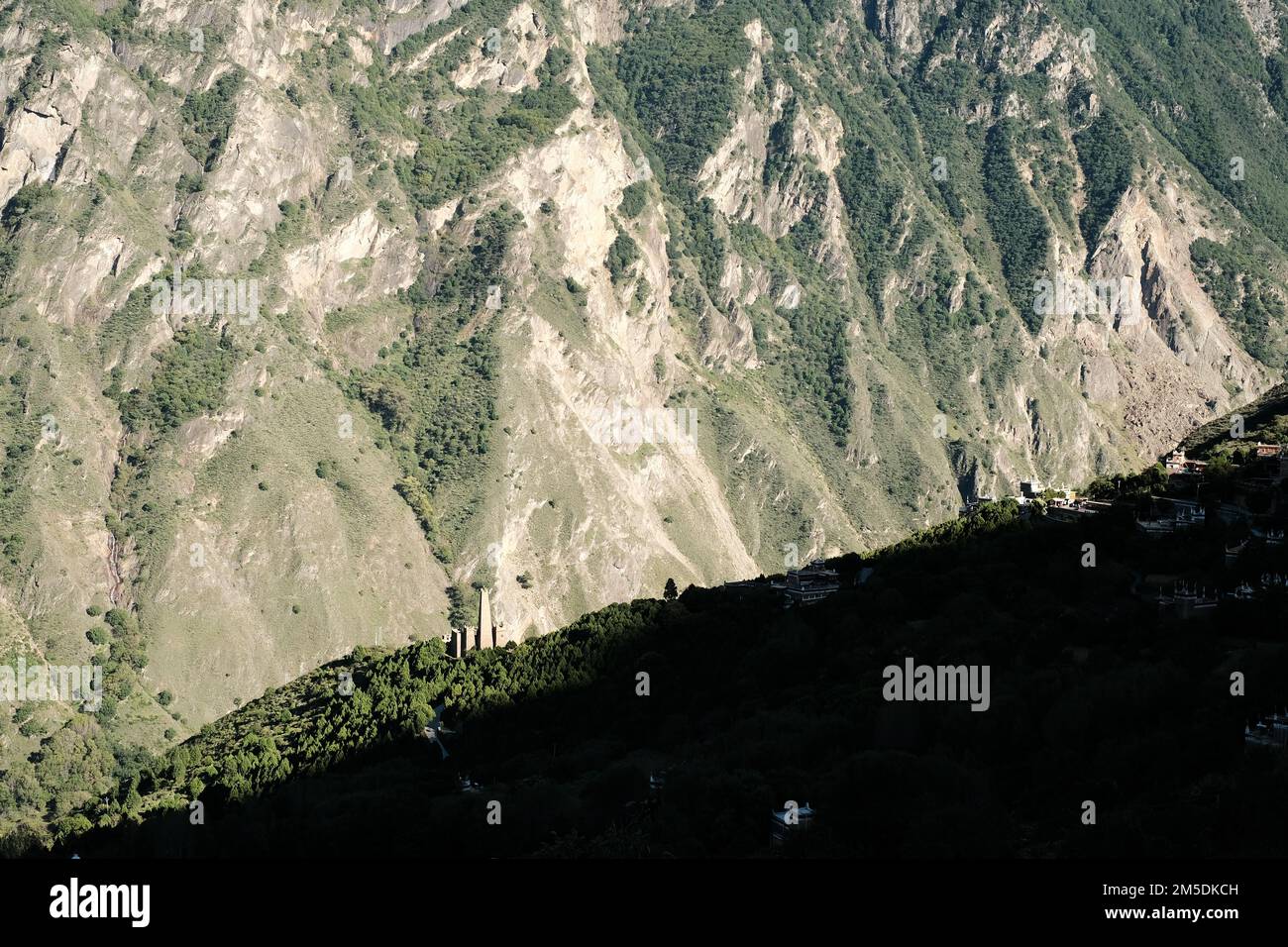 The panoramic view of mountain valley. The mountain village. Steep ...