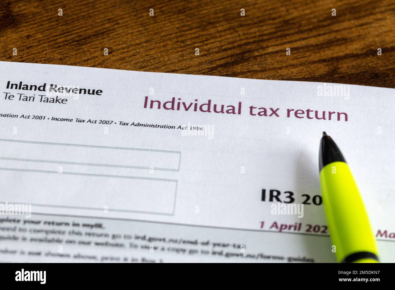 New Zealand individual tax return, IR3 print and pen lying on the desk ...