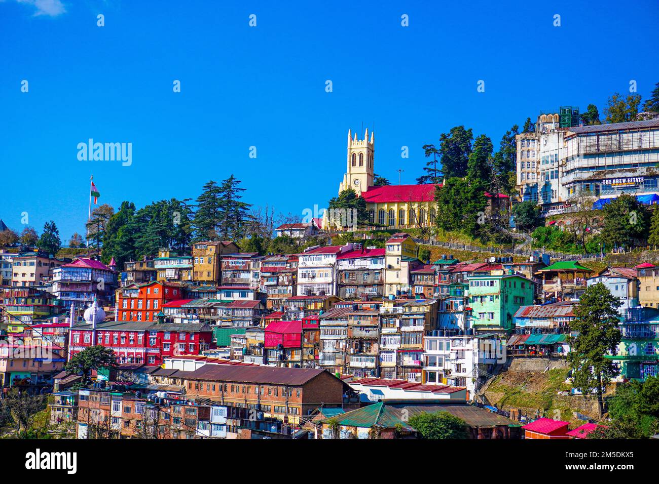 A low-angle view of modern buildings in Shimla, India Stock Photo - Alamy