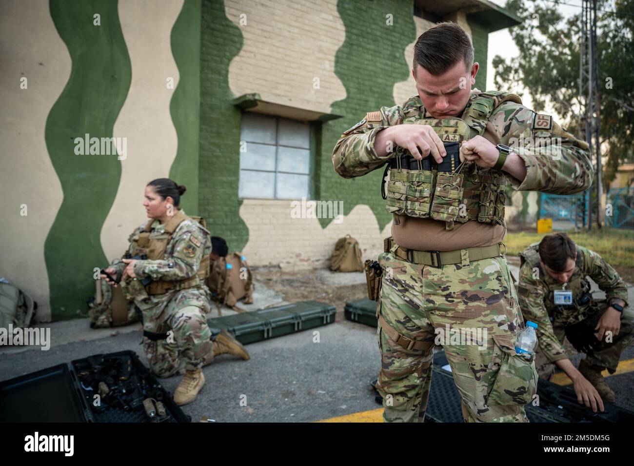 U.S. Air Force Security Forces members prepare to start their shift ...