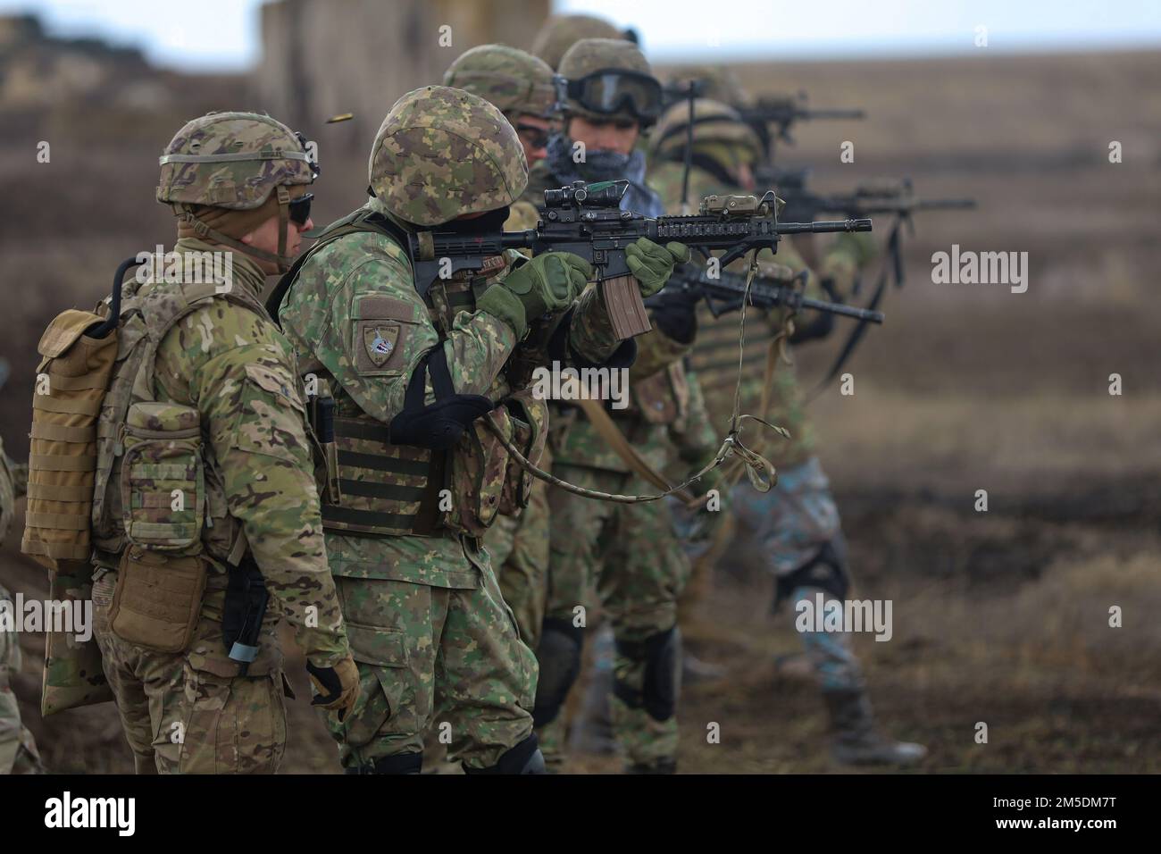 U.S. Army Soldiers and Romanian Soldiers demonstrate their small arms ...