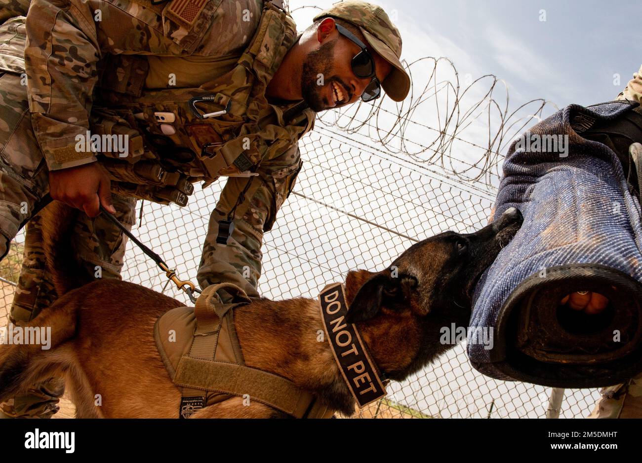 U.S. Air Force Staff Sgt Sirmann Toliver, a military working dog ...