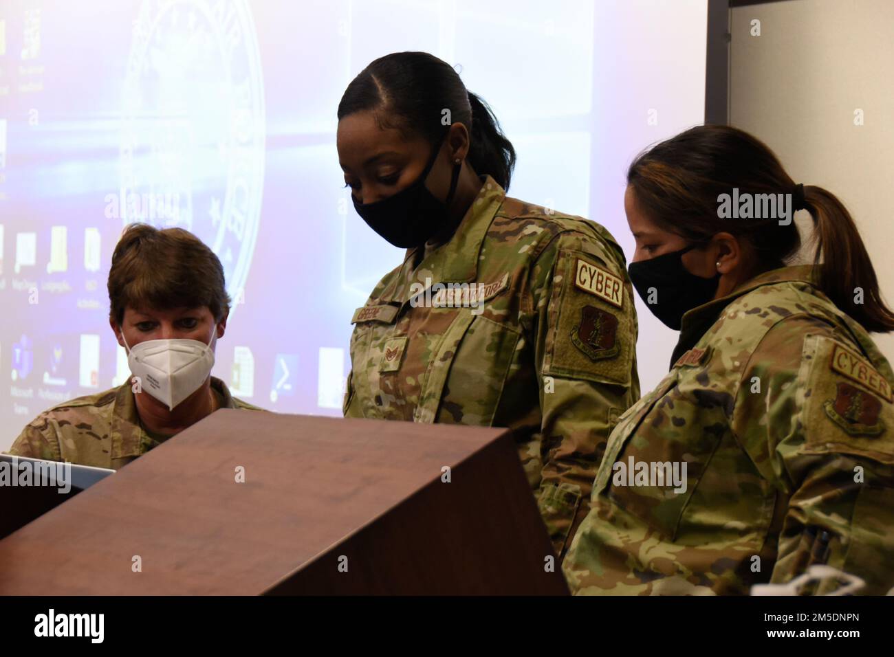 U.S. Air Force Chief Master Sgt. Pennie Brawley (left), 156th Airlift ...