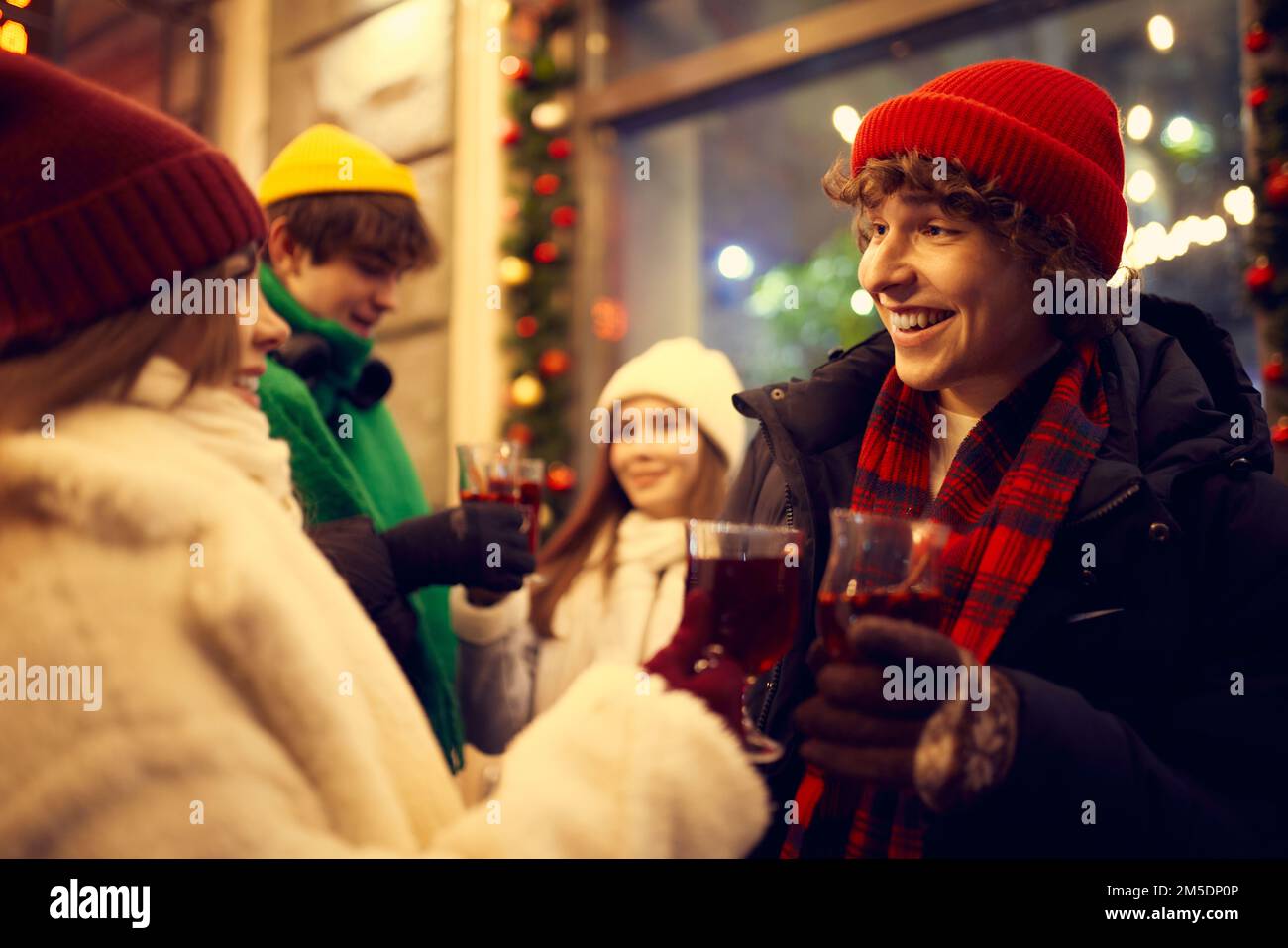 Happy youth. Emotional young people, friends meeting, smiling, drinking ...
