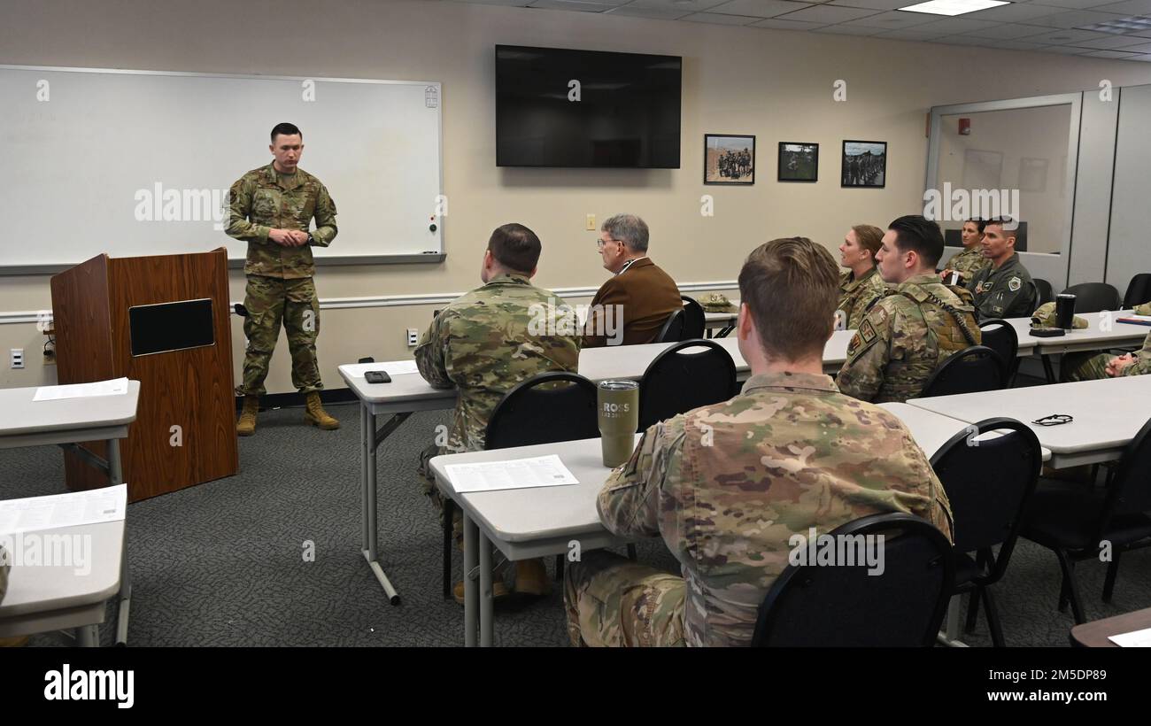 U.S. Air Force Maj. Zachary Blades, left, 175th Wing Security Forces ...