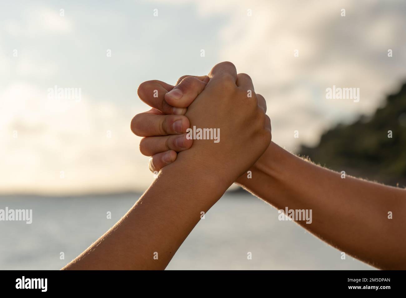 Hands on support hi-res stock photography and images - Alamy