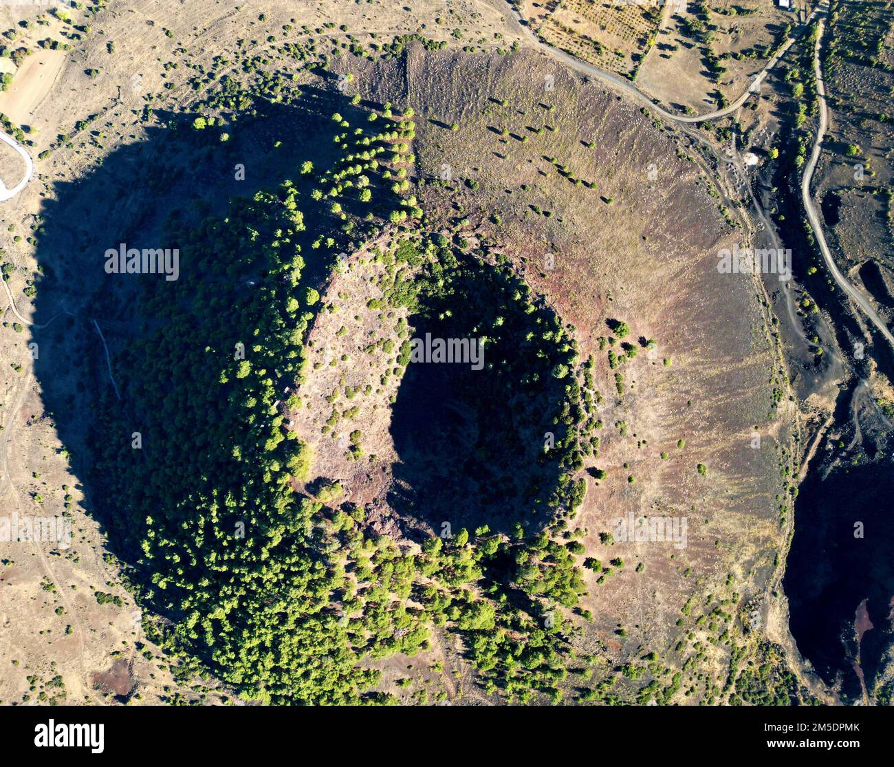 An aerial of the Divlit extinct volcano, mount formantion covered in ...