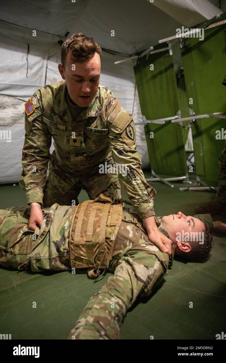 U.S. Army Spc. Brendan Titus, a medic with 325th Brigade Support ...