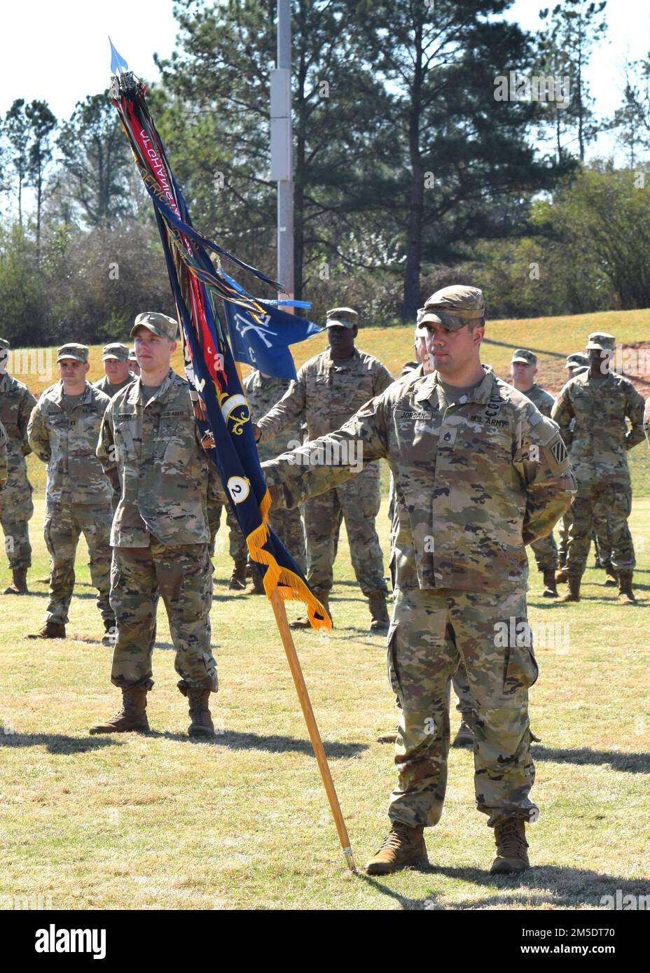 Staff Sgt. Tanner Jordan secures the colors of the 2nd Battalion 121st ...
