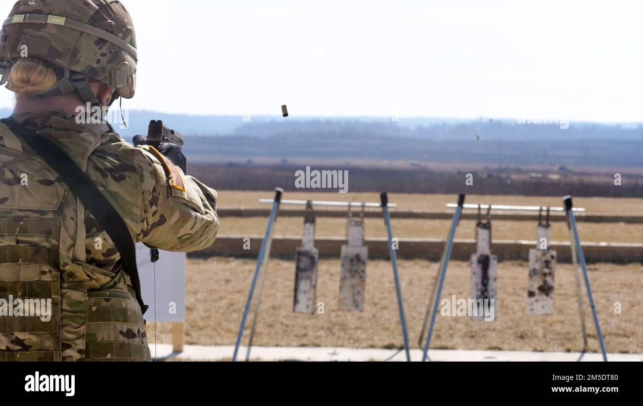 Spc. Alexis Cummins, of the 384th Military Police Company competes in ...
