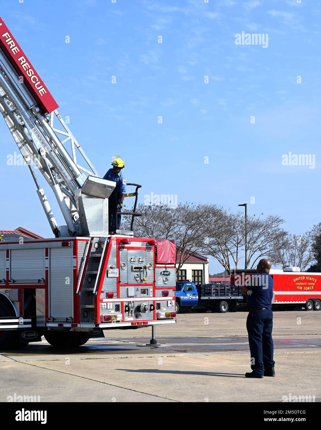 Charles Smith (left), a driver and operator with the 42nd Air Base Wing ...