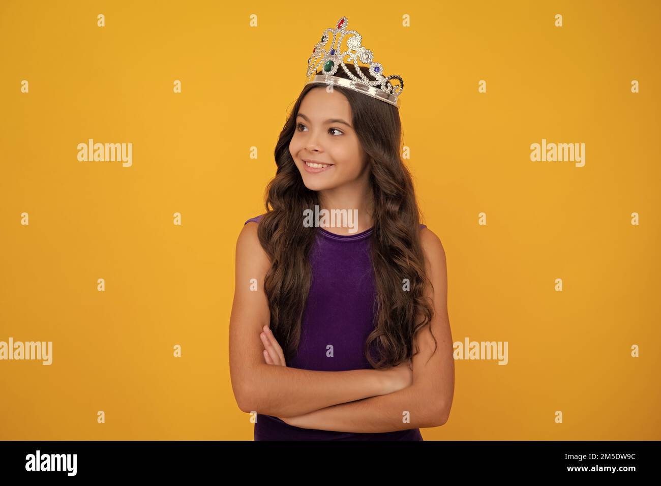 Portrait of ambitious teenage girl with crown, feeling princess ...