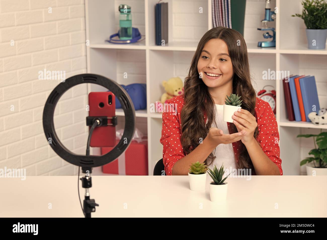 Blogging, videoblog. Teenager child blogger with phone recording video ...