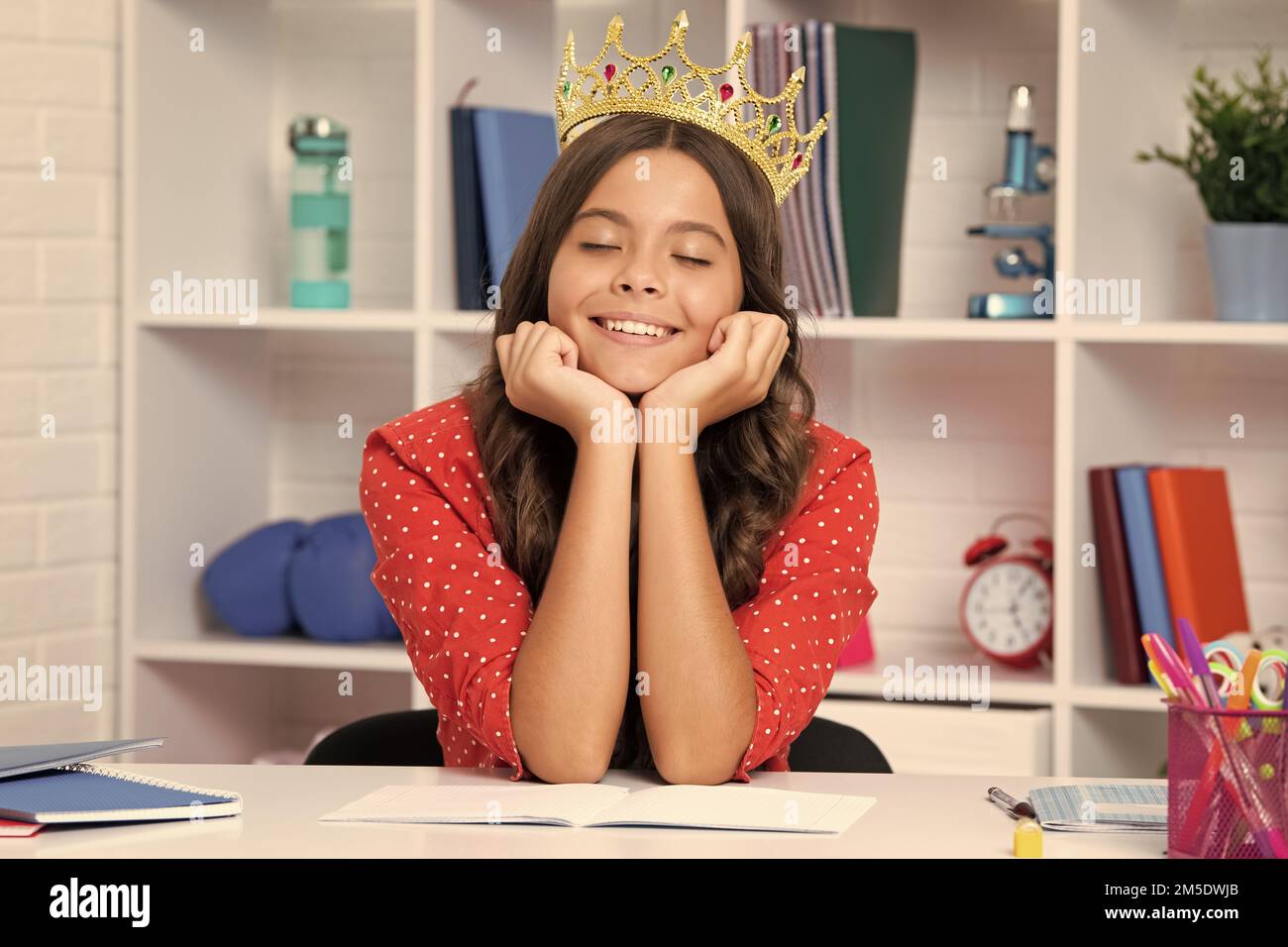 Princess school girl. Portrait of dreaming teenage girl with crown ...