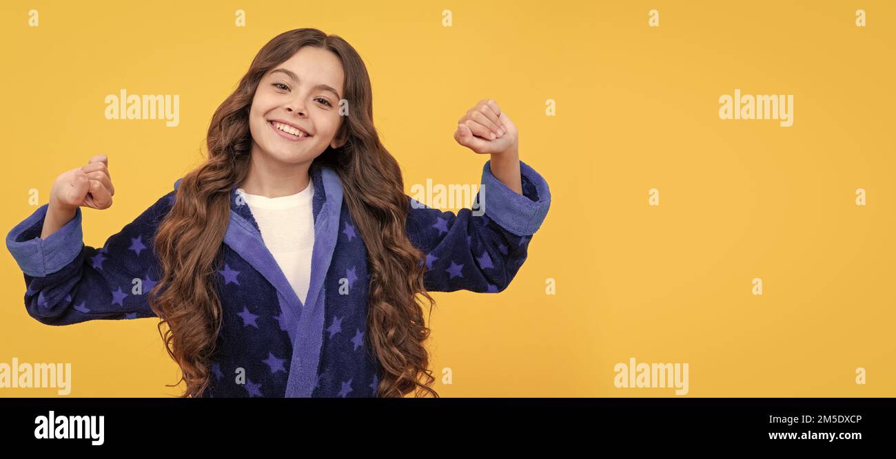 in good mood. sleepy kid stretching sleepily. smiling child wearing ...