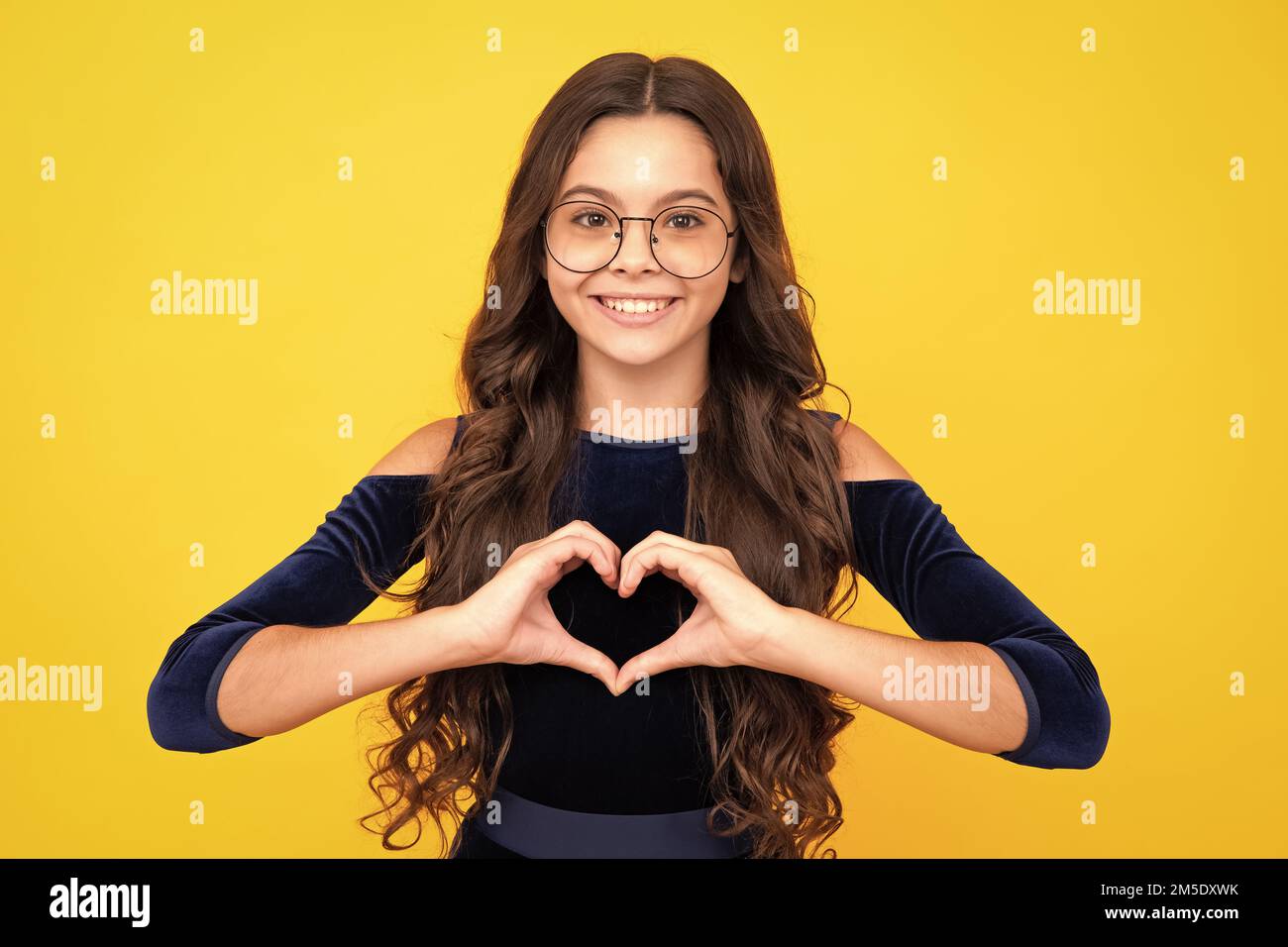 Child hand making heart hi-res stock photography and images - Alamy