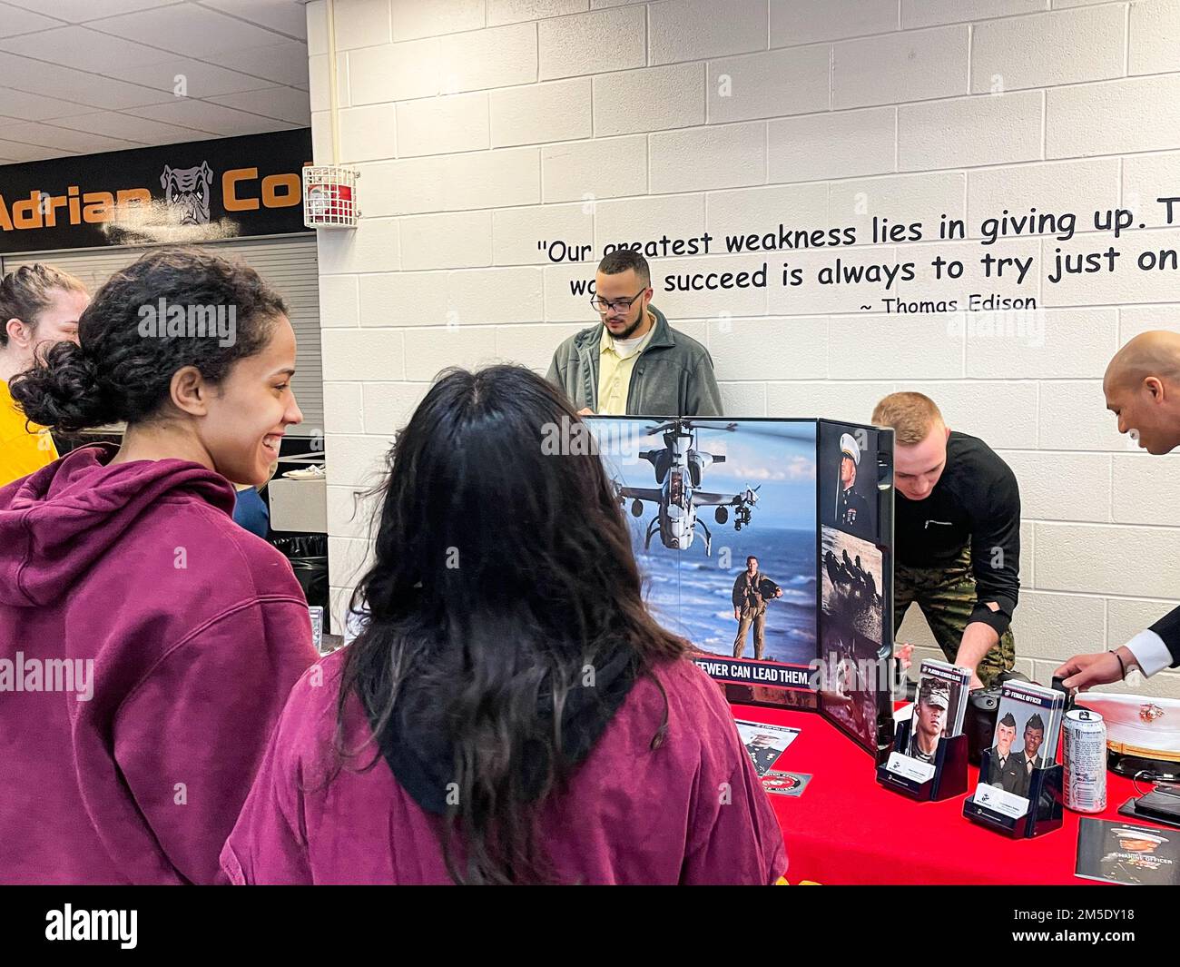 Student athletes approach the Marine Corps booth to learn more about ...