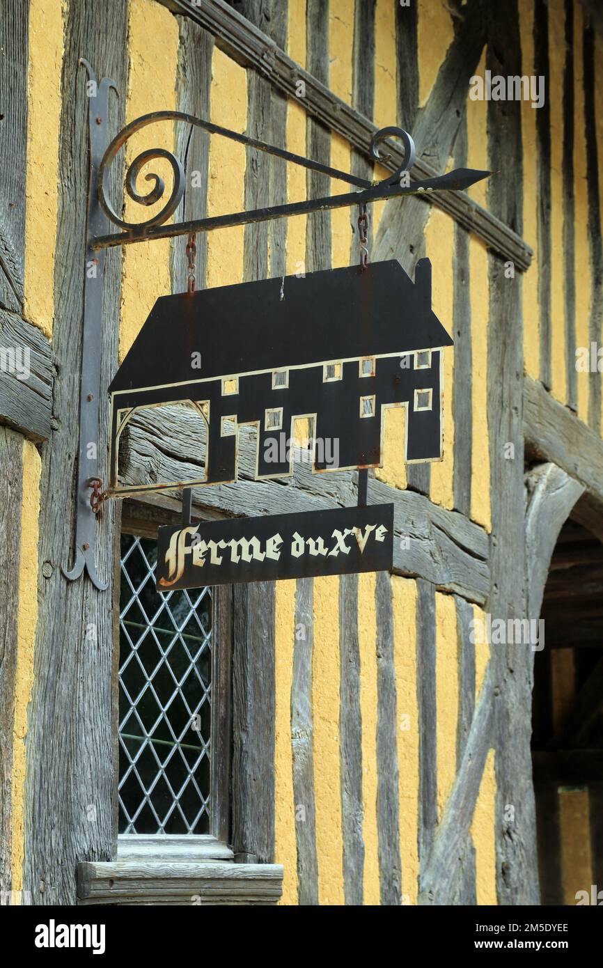 Medieval farm sign at Chateau de Crevecoeur, Crevecoeur-en-Auge ...