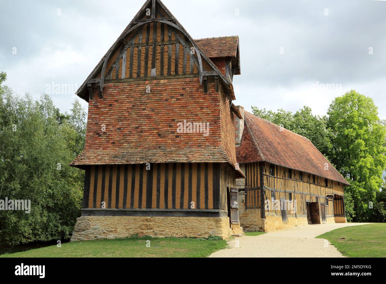 Medieval dovecote and farm building at Chateau de Crevecoeur ...