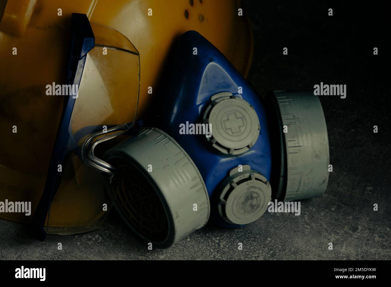 Respirator, goggles and miner protective helmet on concrete floor Stock ...