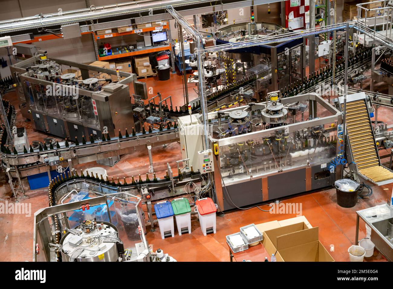 Production of cremant sparkling wine in Burgundy, France. Automatically ...