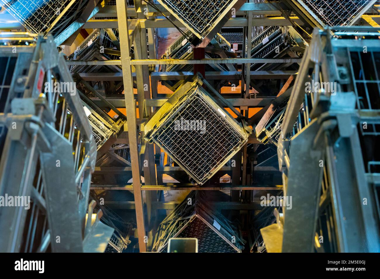 Production of cremant sparkling wine in Burgundy, France. Automatically ...