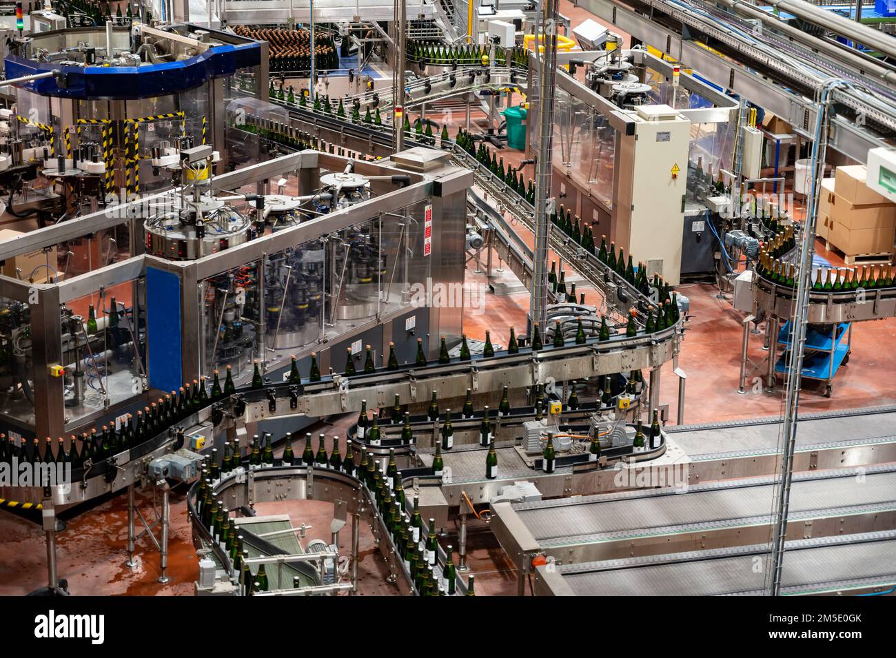 Production of cremant sparkling wine in Burgundy, France. Automatically ...