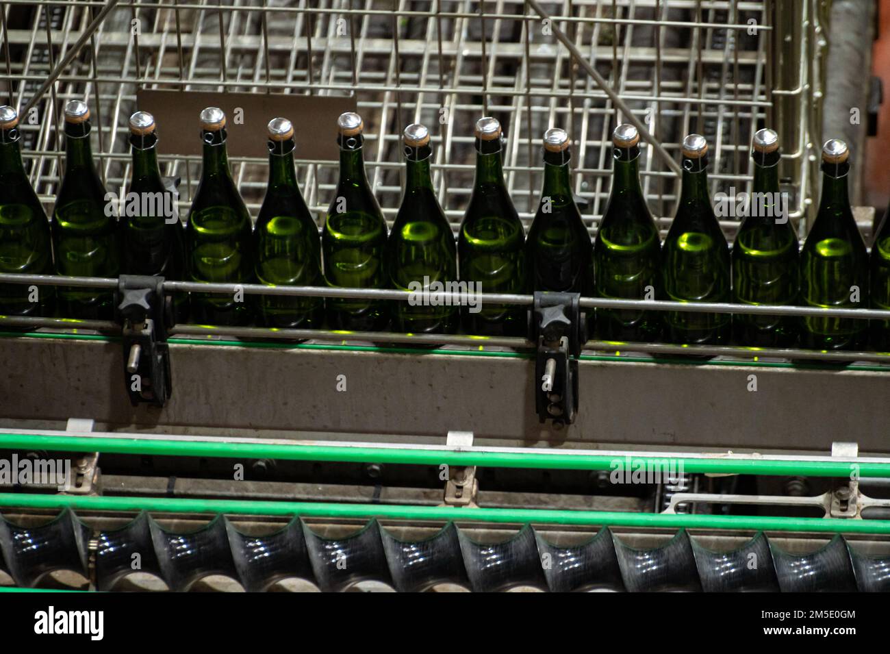 Production of cremant sparkling wine in Burgundy, France. Automatically ...