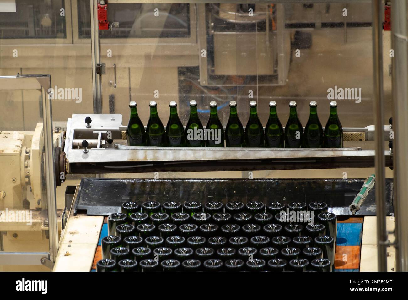 Production of cremant sparkling wine in Burgundy, France. Automatically ...