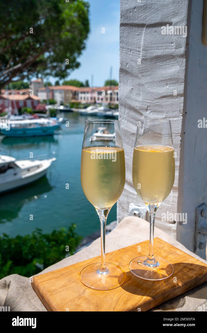 Summer party, drinking of French brut champagne sparkling wine in ...