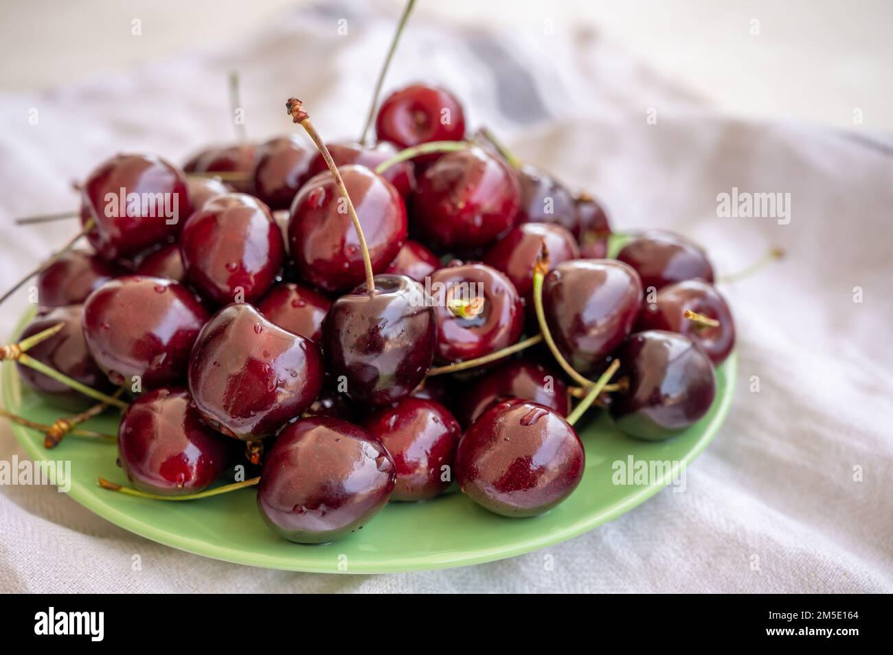 Giant french fresh ripe black cherries, new harvest, ready to eat close ...