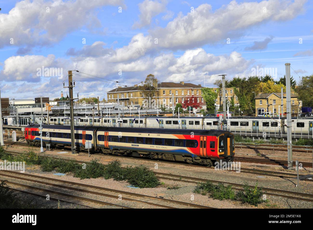 EMR Regional trains 158854 at Peterborough railway station, East Coast ...