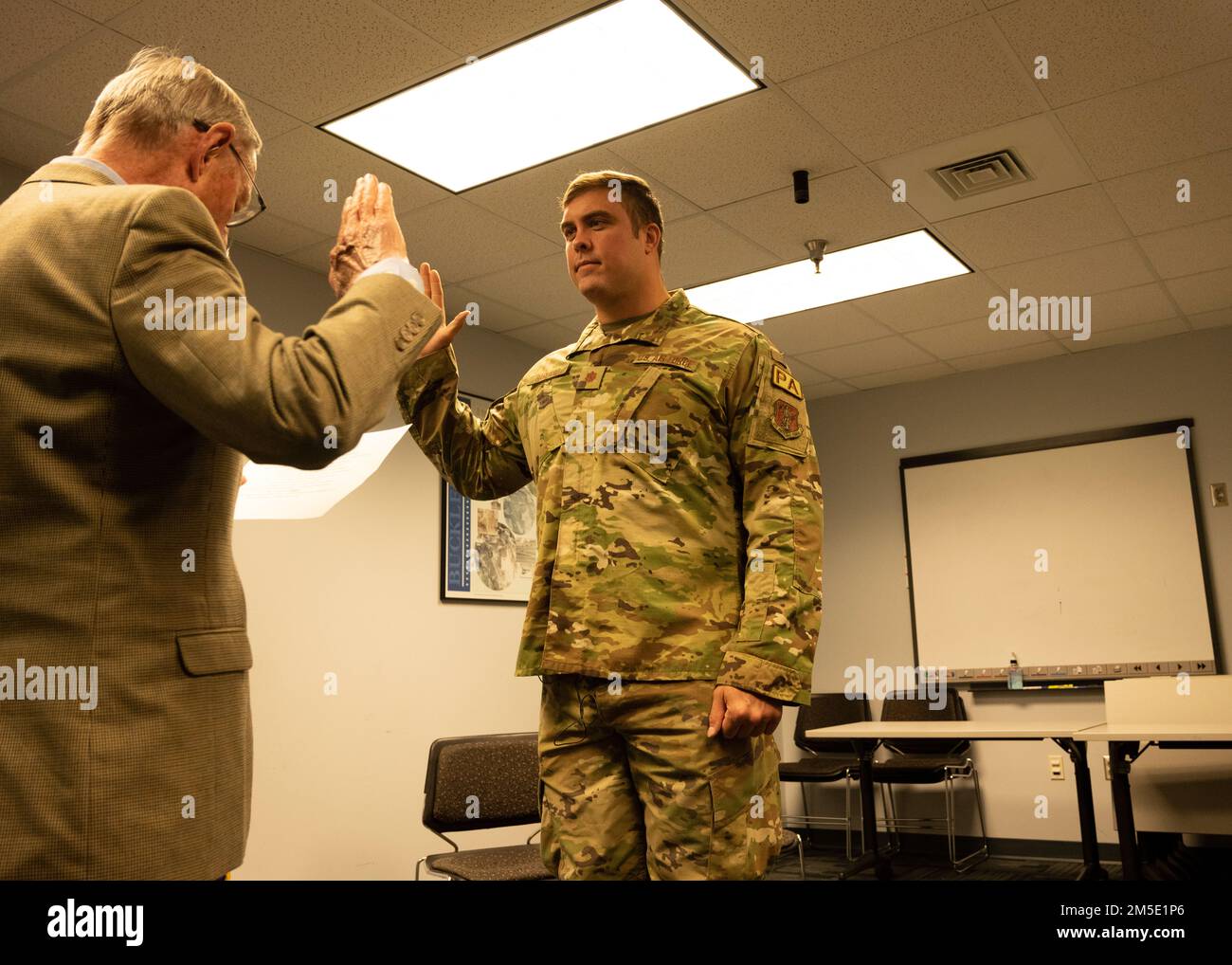 U.S. Air Force retired Col. Hal Garland swears in his grandson Maj ...
