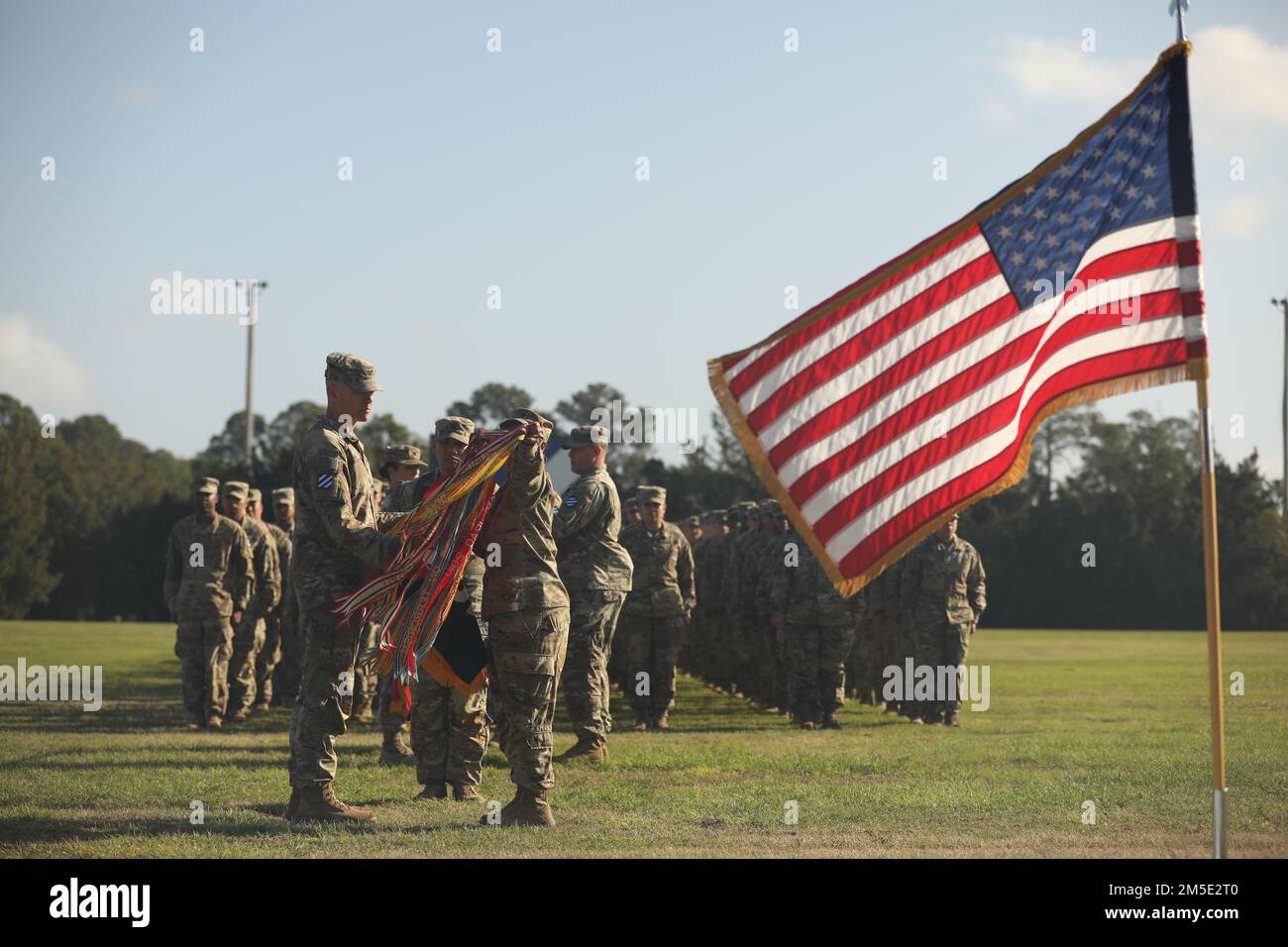 Col. David Key and Command Sgt. Maj. Denice Malave uncase the 3rd ...