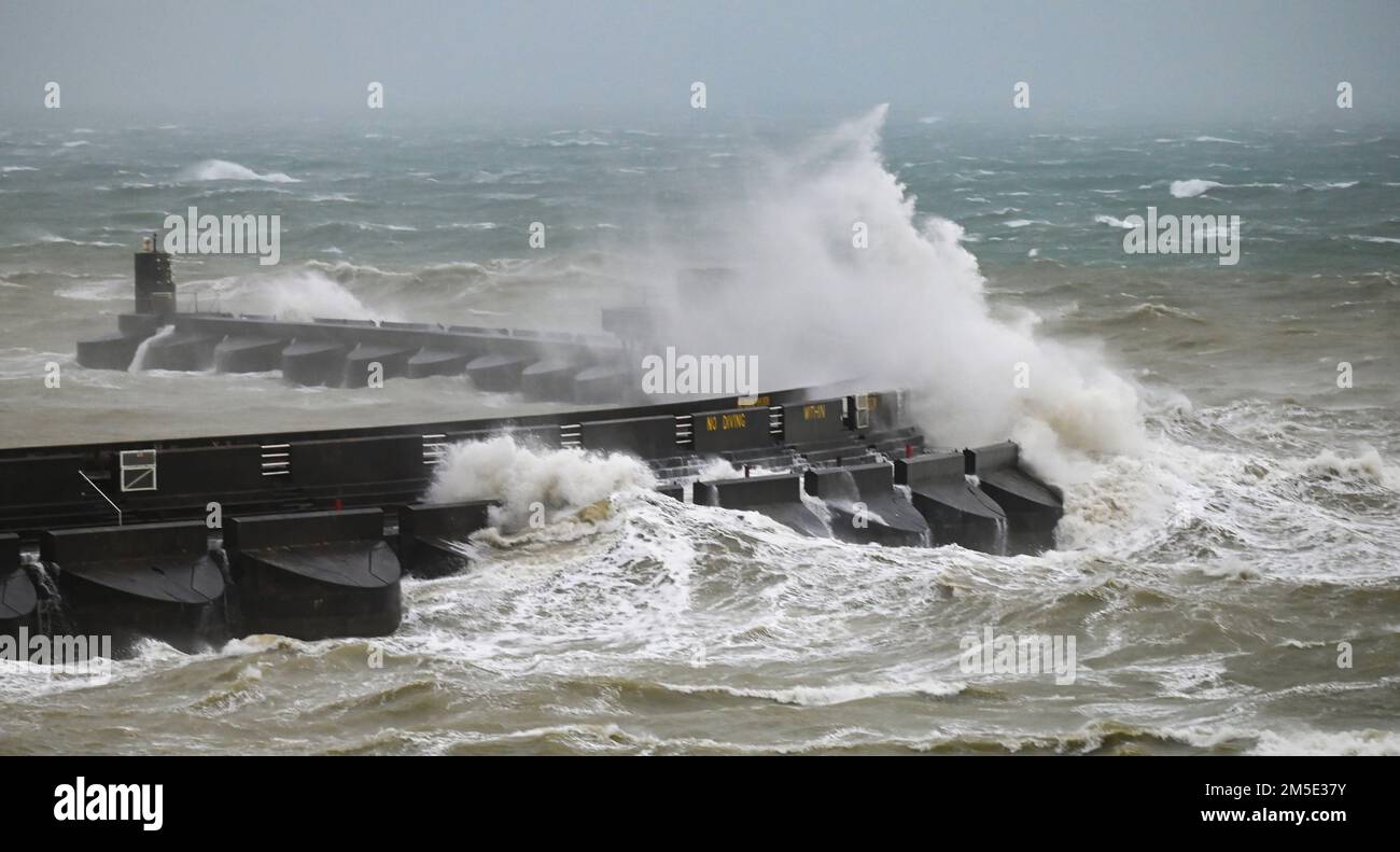 Brighton UK 28th December 2022 - Huge waves crash over the western arm ...