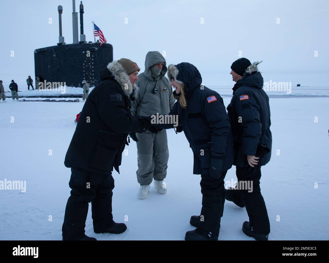 BEAUFORT SEA, Arctic Circle (March 6, 2022) – Cmdr. Dan McNab, left ...