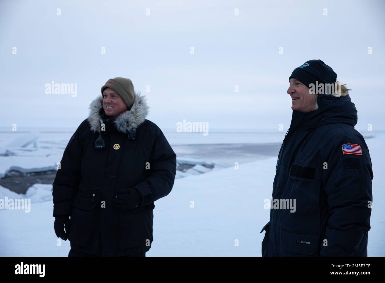 BEAUFORT SEA, Arctic Circle (March 6, 2022) – Cmdr. Dan McNab, left ...