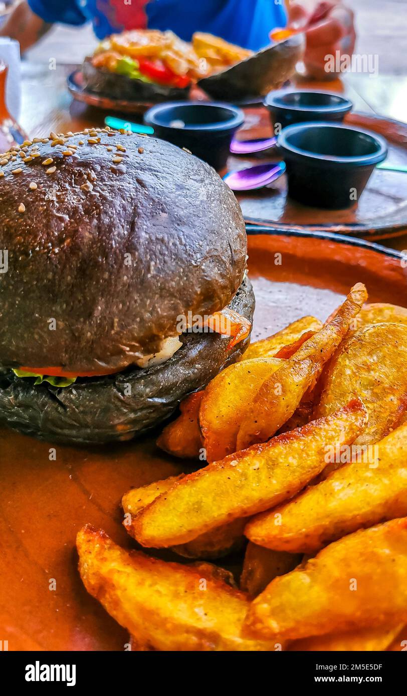 Fast food in the restaurant hamburger and fries in Playa del Carmen ...