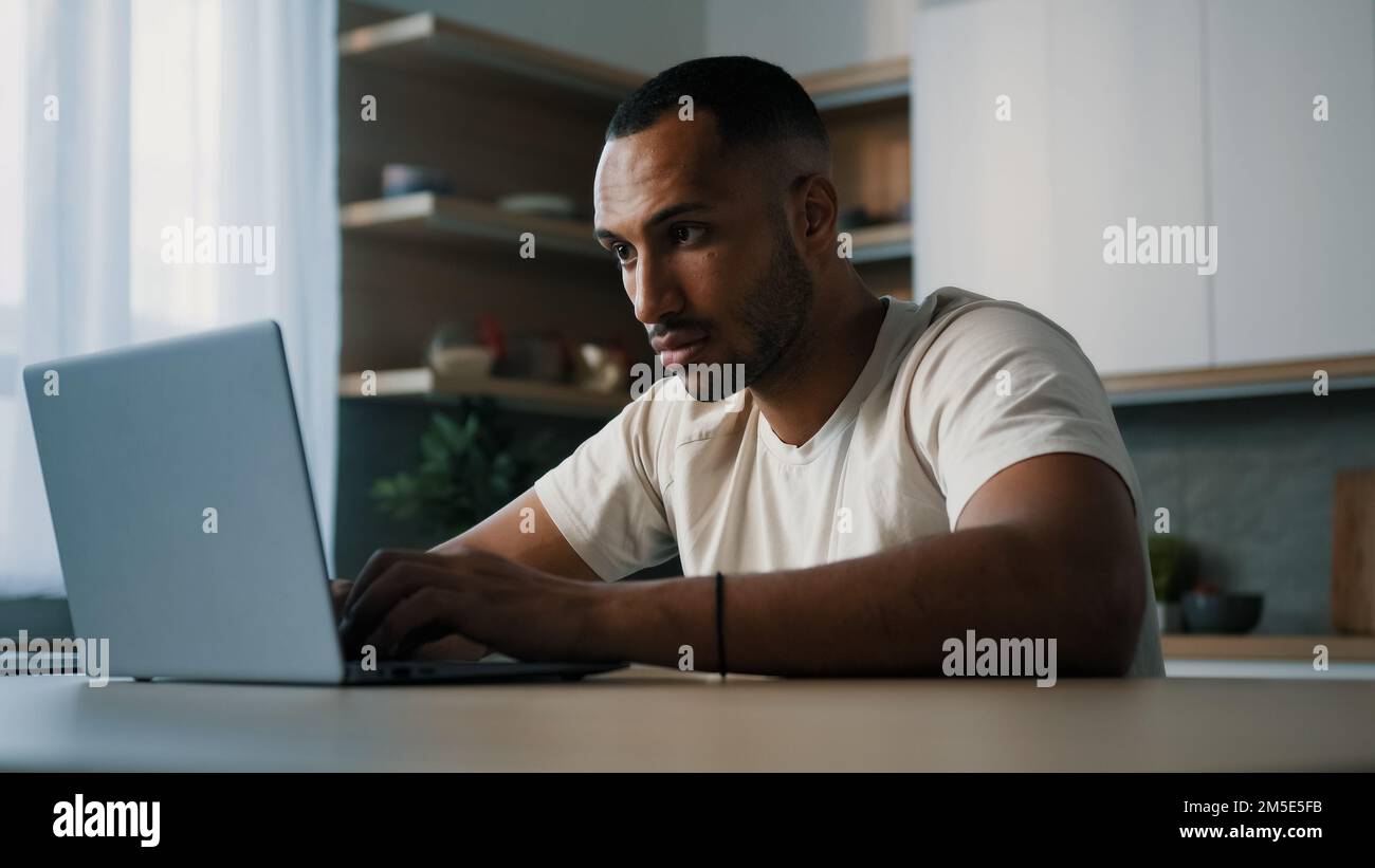 Mad sad unhappy panic male looser African millennial man guy American ...