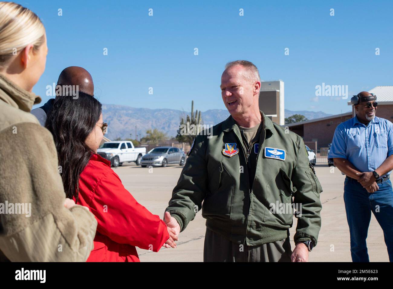 U.S. Air Force Gen. Mark Kelly, commander of Air Combat Command, greets ...