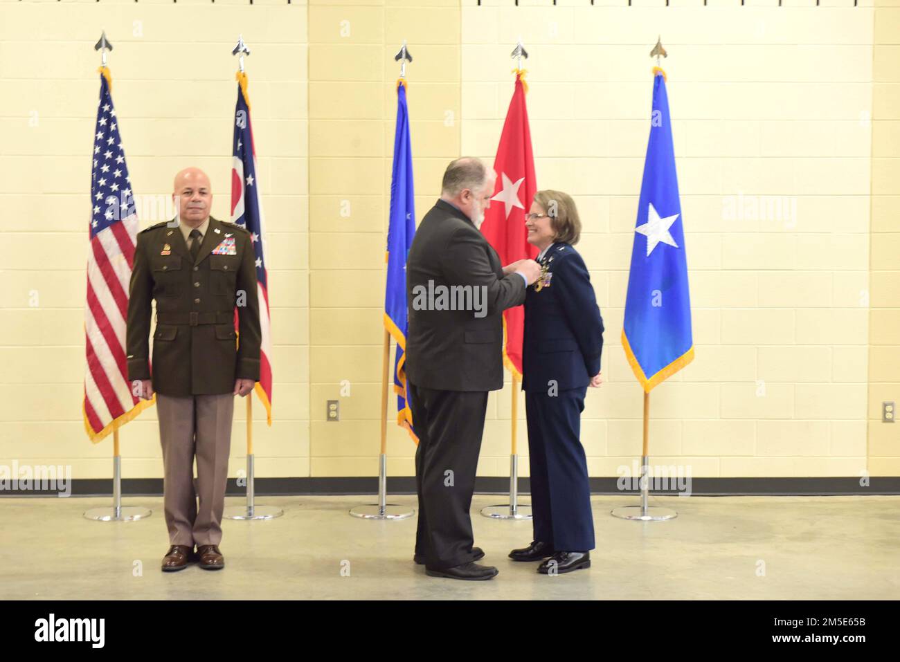 U.S. Air Force Brig. Gen. Rebecca O'Conner receives a retirement pin ...
