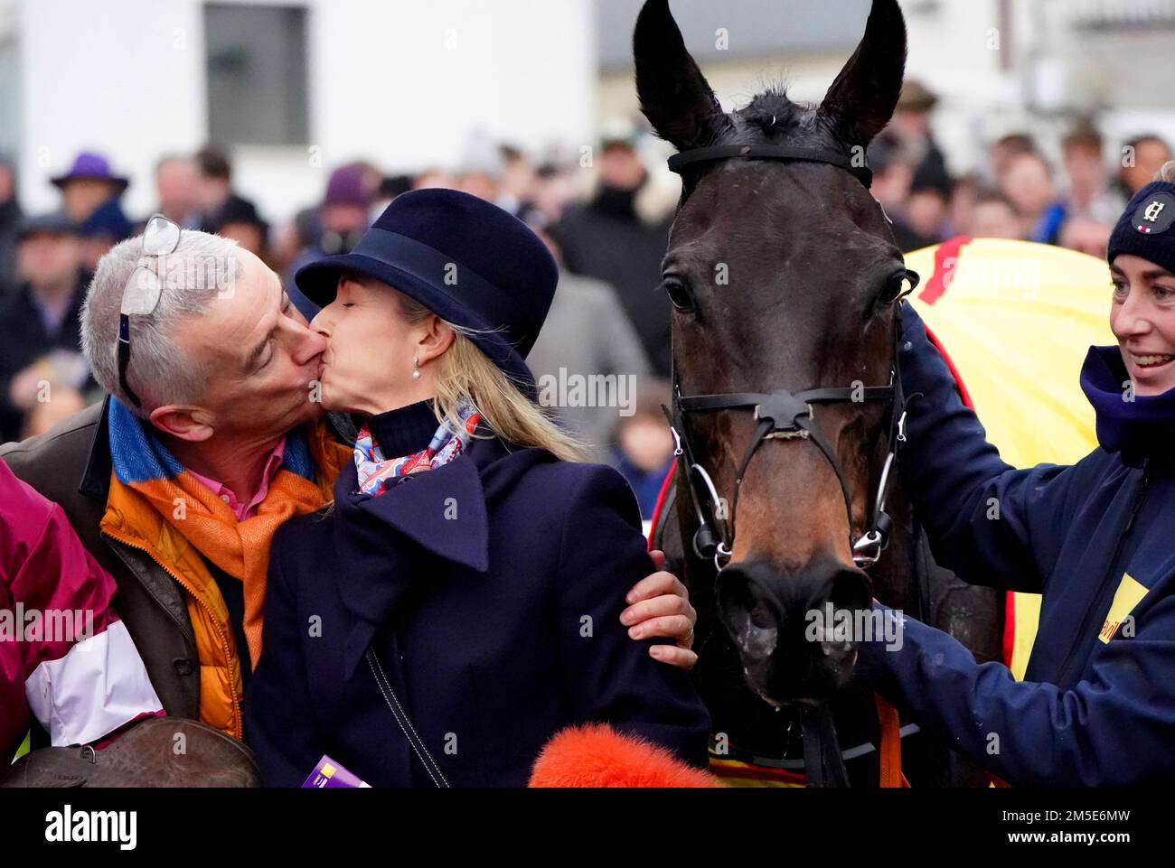 Owner Michael O'Leary and his wife Anita Farrell share a kiss as they ...