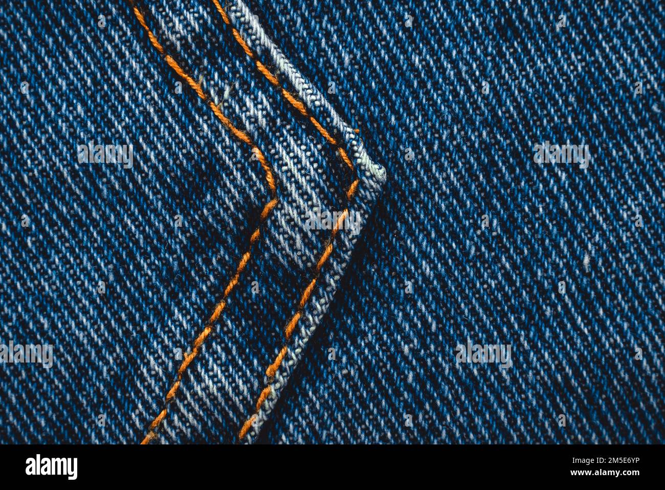 Line on jeans. Denim texture with fine stitching Stock Photo - Alamy