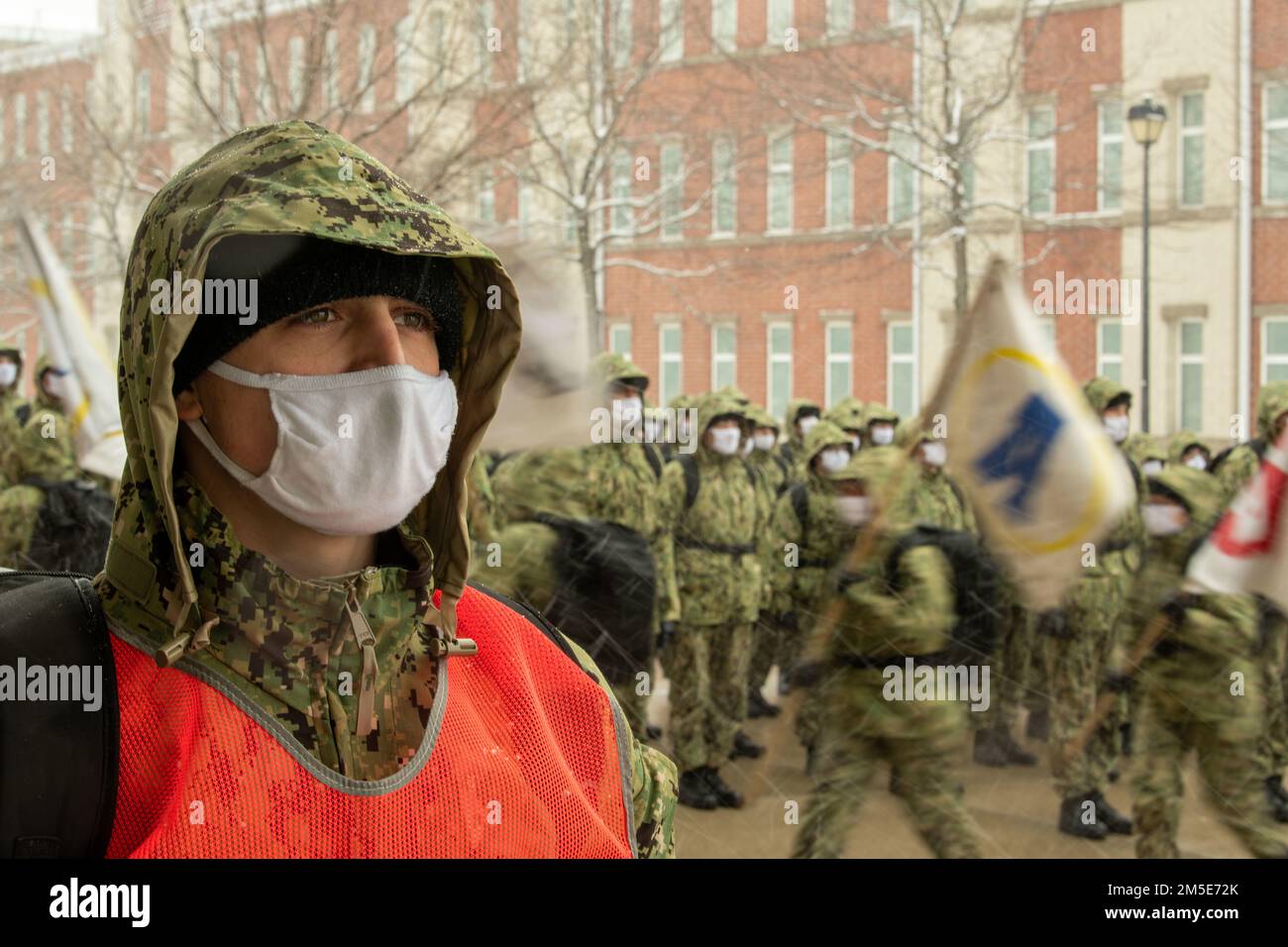 A recruit waits for instruction while his division reconfigures their ...